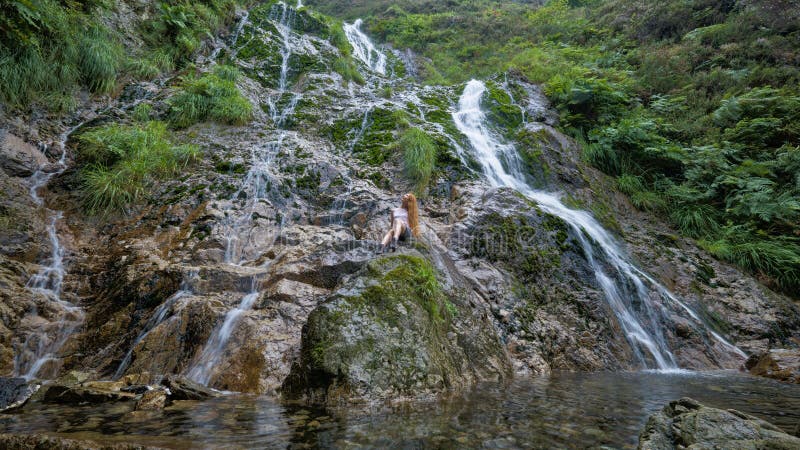 Cascading Waterfall Flows Down a Moss-covered Rocky Hillside. Stock Photo - Image of river ...