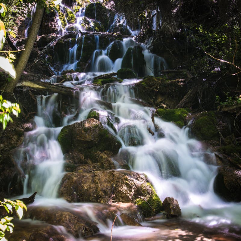 Cascading waterfall. stock image. Image of american, peaceful - 79808657