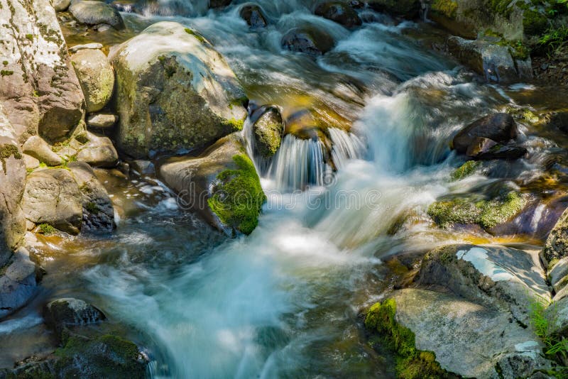 Cascading Waterfall in the Mountains Stock Image - Image of landscape ...