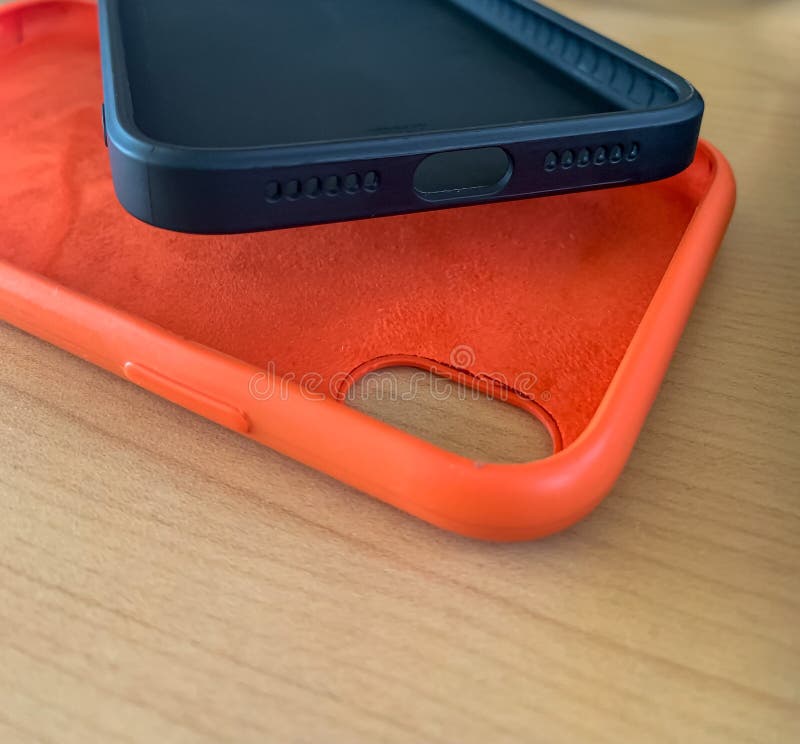 Two Black and Orange Smartphone Cases. Stock Image - Image of warna ...