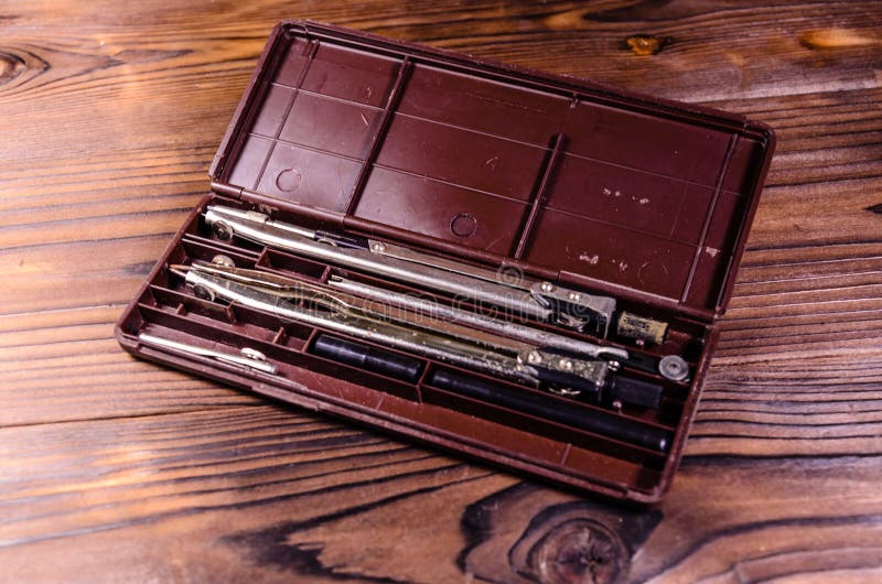 Case of Drawing Instruments on Wooden Table Stock Image - Image of ...