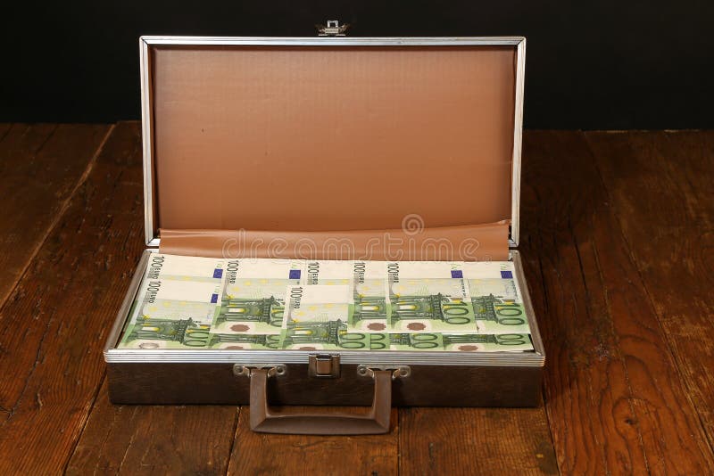 Case Full of Money Standing on the Table Stock Image - Image of ...