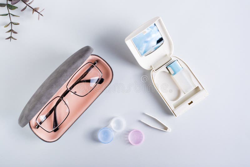 A Case with Glasses, a Container with Contact Lenses and a Set for ...