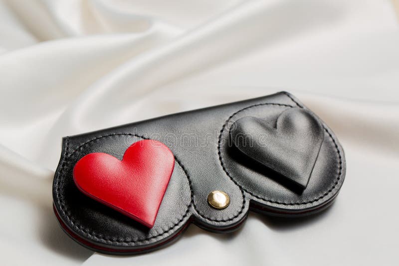 A Case for Glasses Made of Genuine Leather with Hearts on a White ...