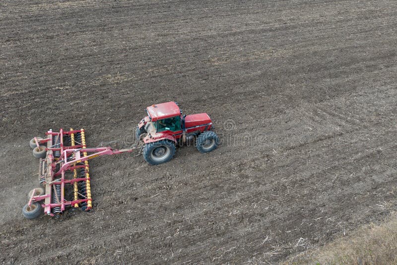 A Case IH 7230 Tractor Pulls a Väderstad Carrier through the Field To ...