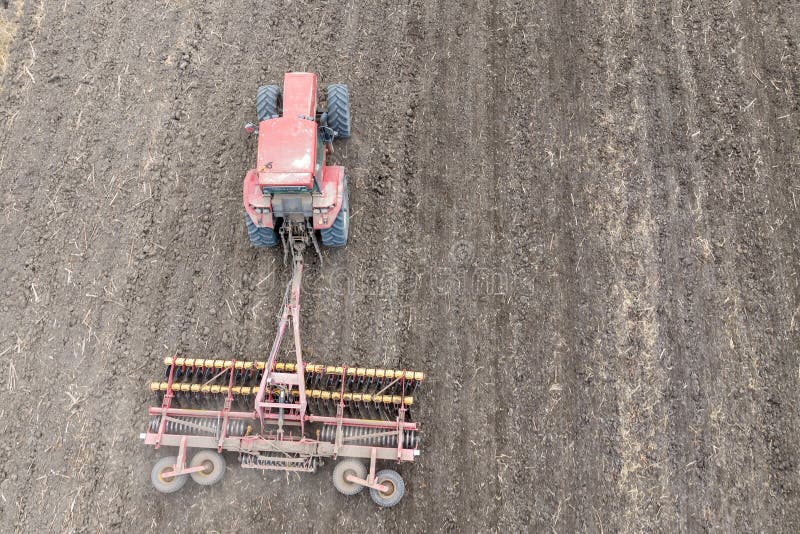 A Case IH 7230 Tractor Pulls a Väderstad Carrier through the Field To ...