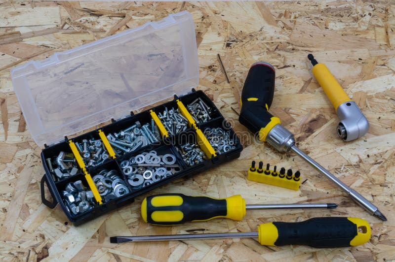 Case Organizer with Fasteners and a Screwdrivers on a Osb Construction ...