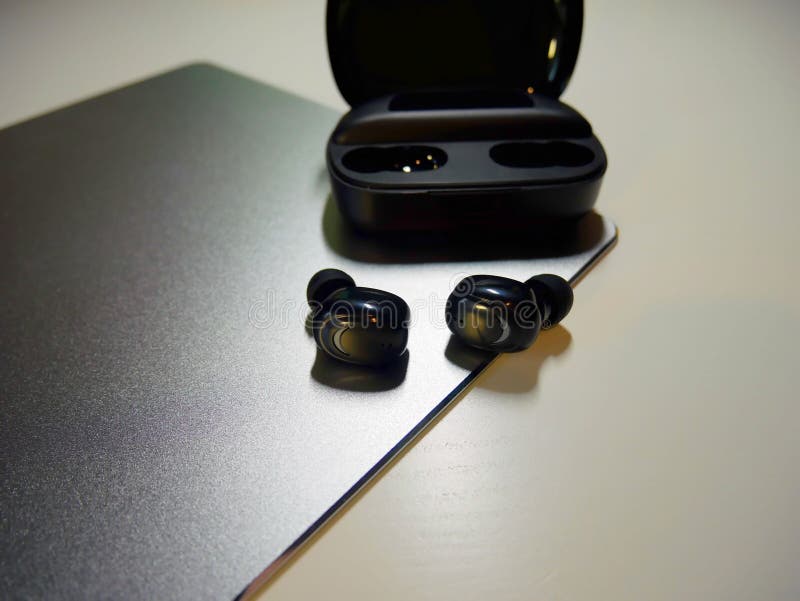 The Case of TWS Headphones is Made of Black. Black Wireless Headphones ...