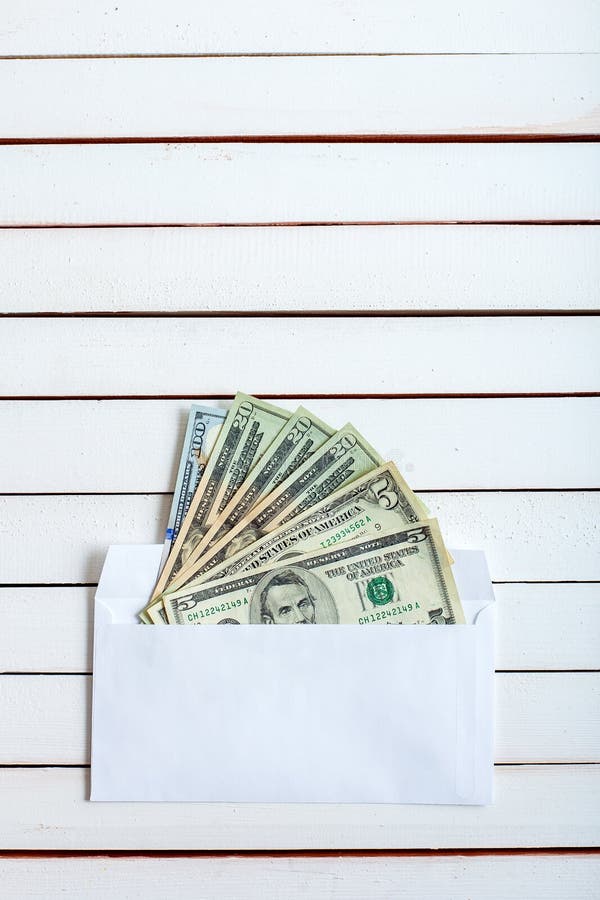 Cash in an Envelope on White Wooden Table. Stock Photo - Image of means ...