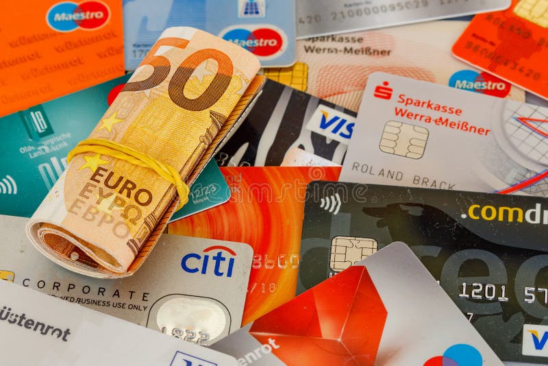 Cash Money on credit cards editorial photography. Image of card - 203094072