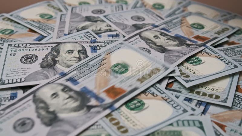 Cash Movement: One Hundred Dollar Bill Slow-Mo Stack Stock Footage ...