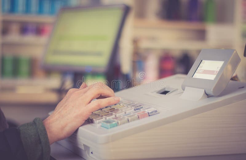 Cash register in a store stock photo. Image of fingers - 142085632