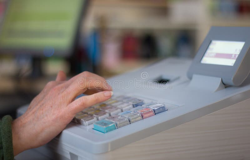 Cash register in a store stock photo. Image of electronic - 142085634