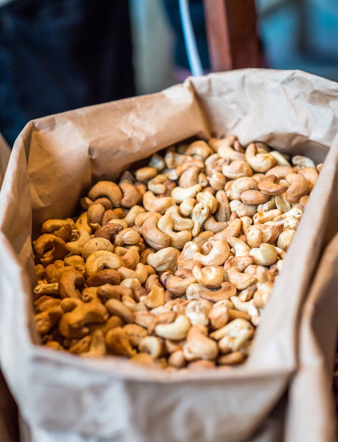 Cashew nuts in paper bag stock photo. Image of stack - 82401612