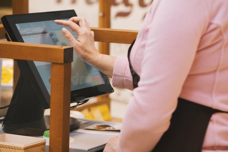 The cashier at the bakery stock photo. Image of cashier - 105250732