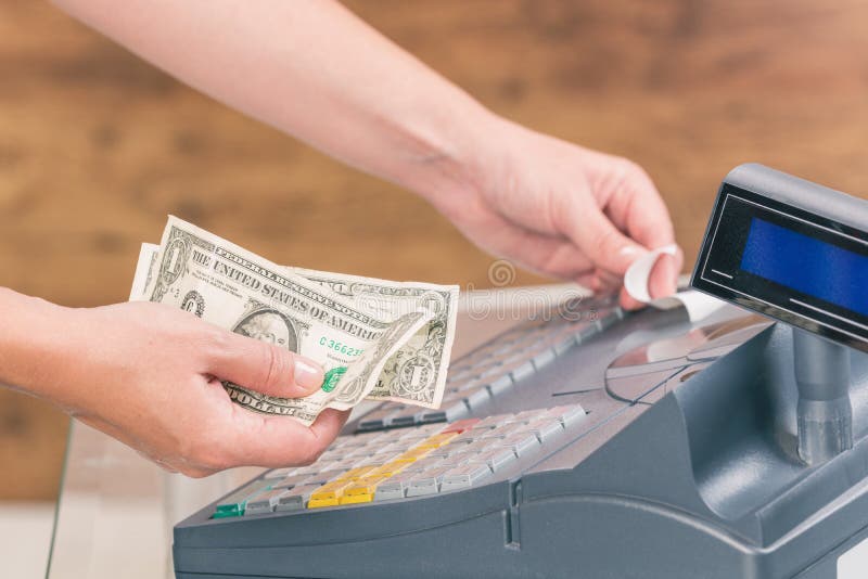 Cashier holdnig banknotes stock image. Image of banking - 77004723