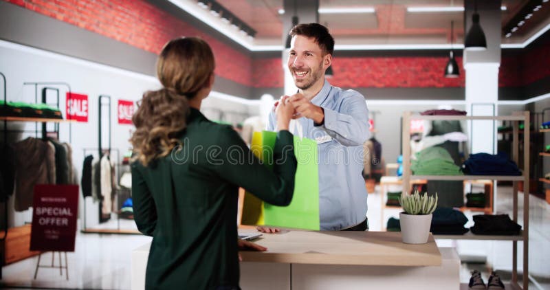 Cashier Retail Assistant at Cloth Store Stock Photo - Image of register ...