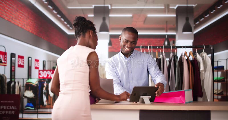 Cashier Retail Assistant at Cloth Store Stock Image - Image of business ...