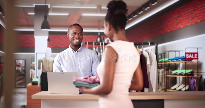 Cashier Retail Assistant at Cloth Store Stock Image - Image of business ...