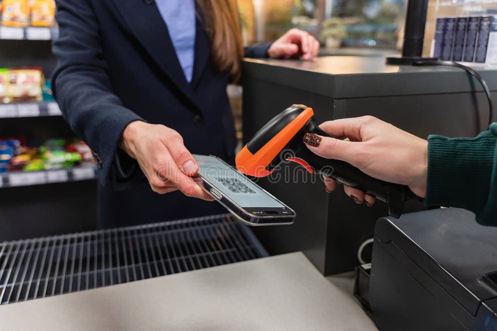 A Cashier Scans a Qr Code from a Smart Phone Using a Barcode Scanner Stock Image - Image of ...