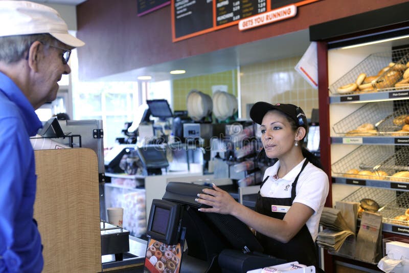 Cashier takes order editorial stock photo. Image of donuts - 21524378