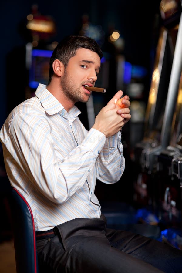 Casino Player Smoking Cigar Stock Photo - Image of cigar, gesture: 20366696