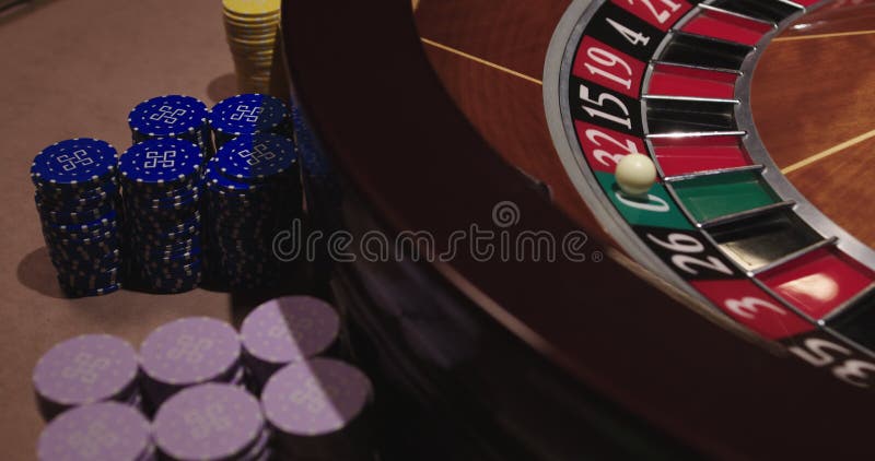 Casino Roulette in Motion, the Spinning Wheel Ball. the Roulette Table ...