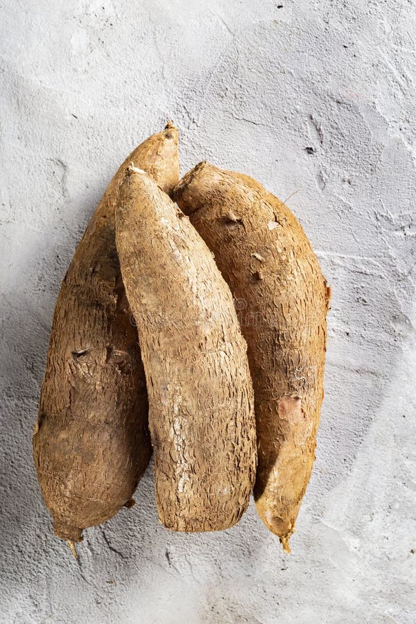 Cassava Root Pile, on a Background of Gray and White Texture (Manihot ...