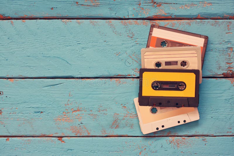 Cassette Tapes Over Blue Textured Wooden Table . Top View Stock Image ...