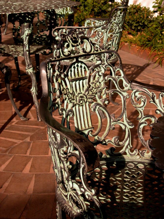 Cast Bronze chairs stock photo. Image of patio, courtyard - 572436