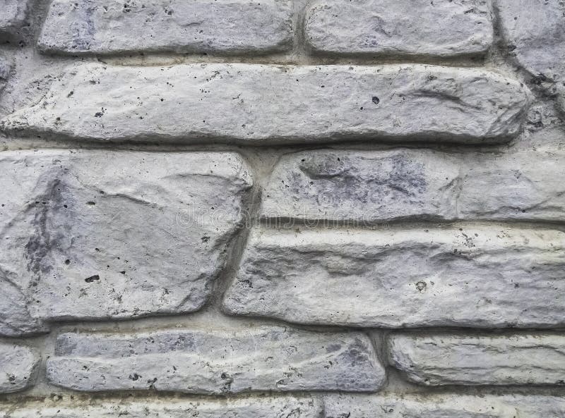 Cast Figured Cement Fence. the Texture of Stone Tiles. Stock Photo ...