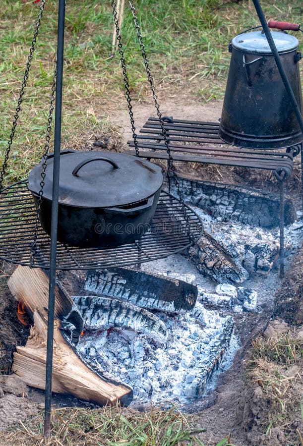 Cast Iron Cooking Over a a Camp Fire Stock Image - Image of travel ...