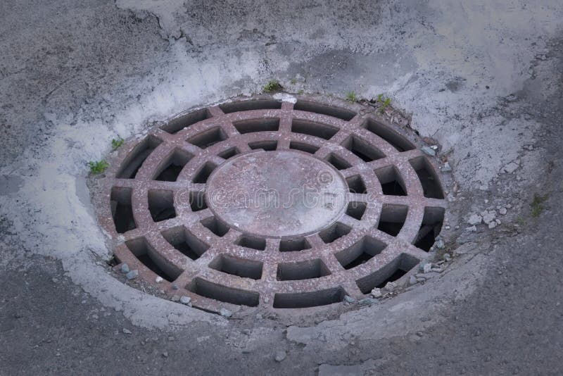 Cast-iron Manhole Cover Storm Sewer. Stock Image - Image of water ...