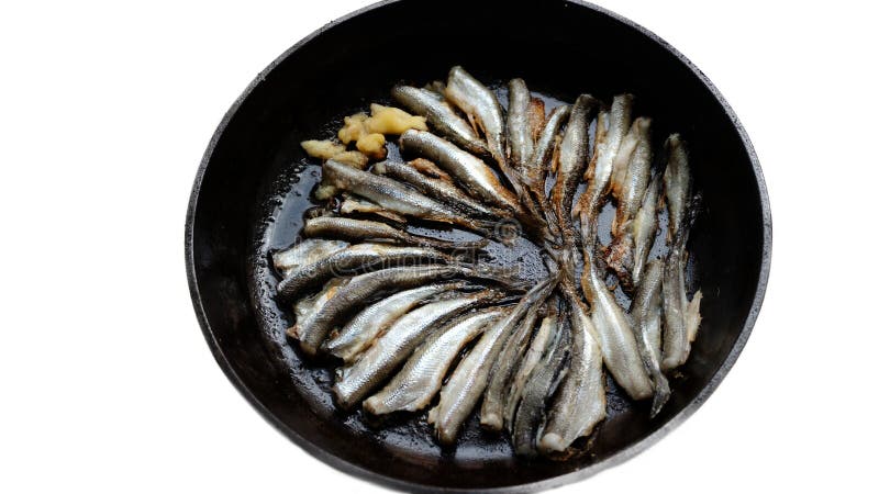 Cast-iron Pan for a Fire and Fried Small Fish Stock Photo - Image of ...