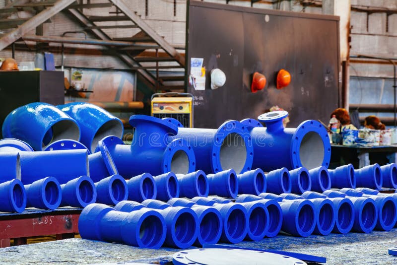 Cast Metal Blue Pipe Connection Parts at Workshop Stock Image - Image ...