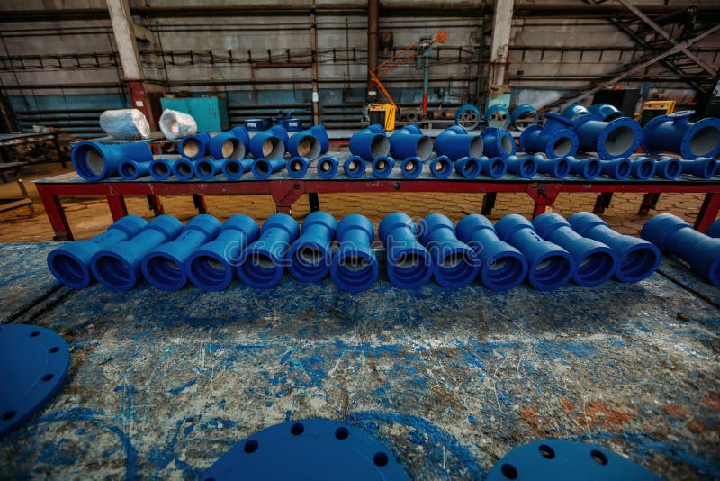 Cast Metal Blue Pipe Connection Parts at Workshop Stock Photo - Image ...