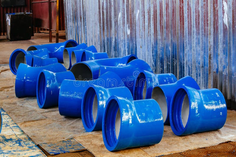 Cast Metal Blue Pipe Connection Parts at Workshop Stock Image - Image ...