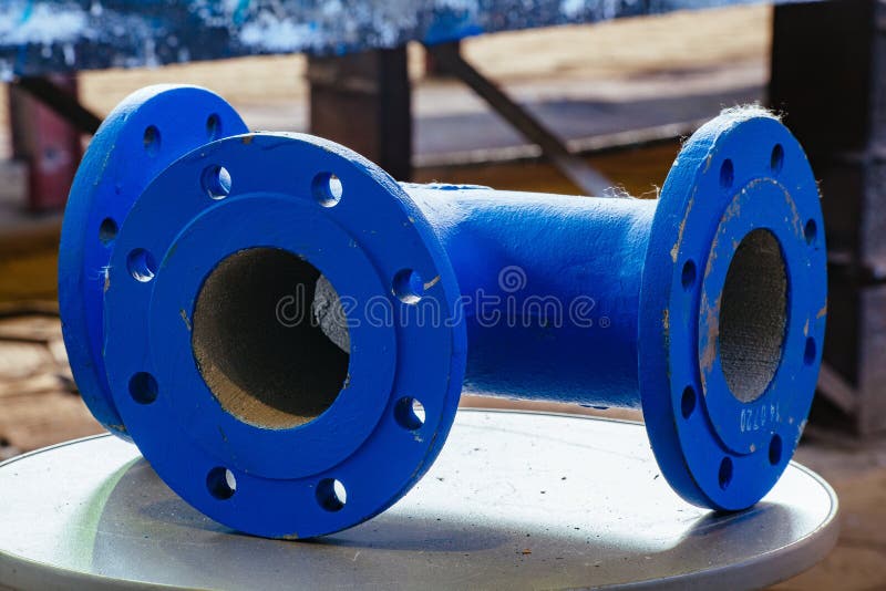 Cast Metal Pipe T Shape Connection on Gray Table Stock Photo - Image of ...