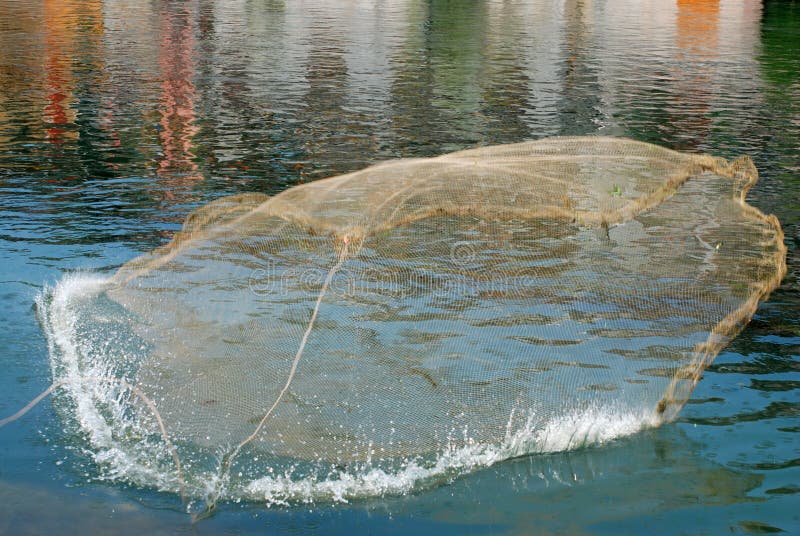 Cast net fishing stock image. Image of fish, sunrise - 34844775