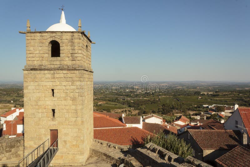 Castle Bell Tower with Village in the Background Stock Image - Image of ...