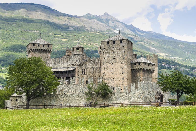 Castle of Fenis stock photo. Image of grass, sunny, cloud - 24477108