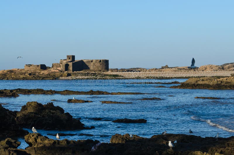 Castle in the Ocean at Sunset Stock Photo - Image of building, atlantic ...
