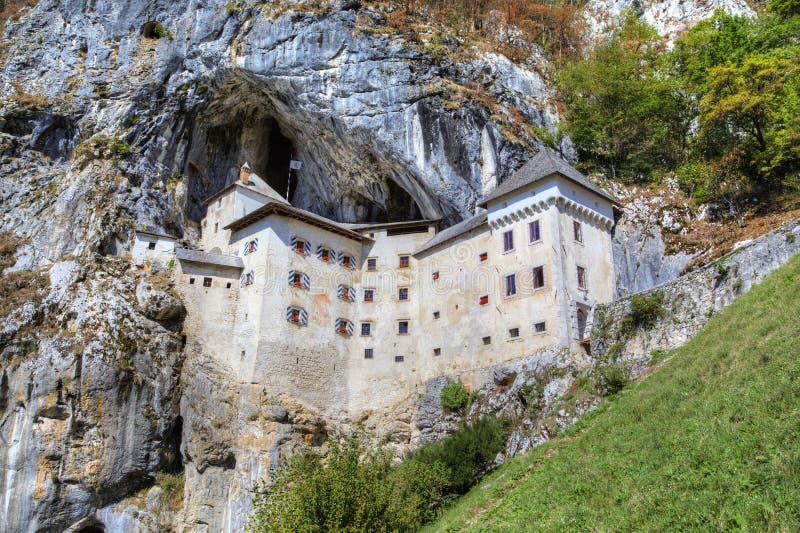 Castle of Predjama (Predjamski Grad or Grad Predjama) Stock Photo ...