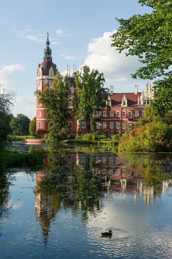 Castle with Reflection in Pond and a Duck. New Castle in Muskau, Bad ...