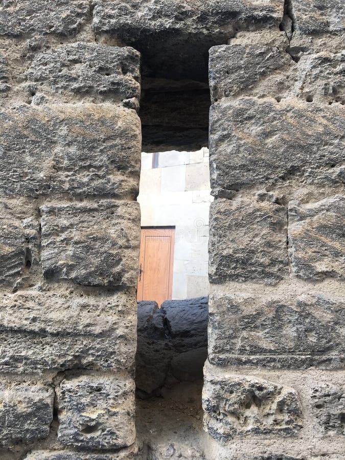 Castle Rock Wall with Narrow Window Stock Image - Image of castle, city ...