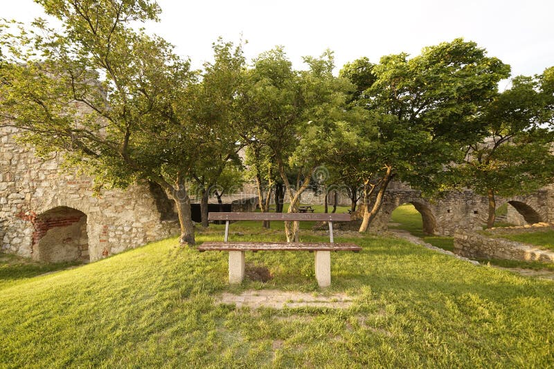 Bench and castle ruins stock photo. Image of ruins, relax - 118682434