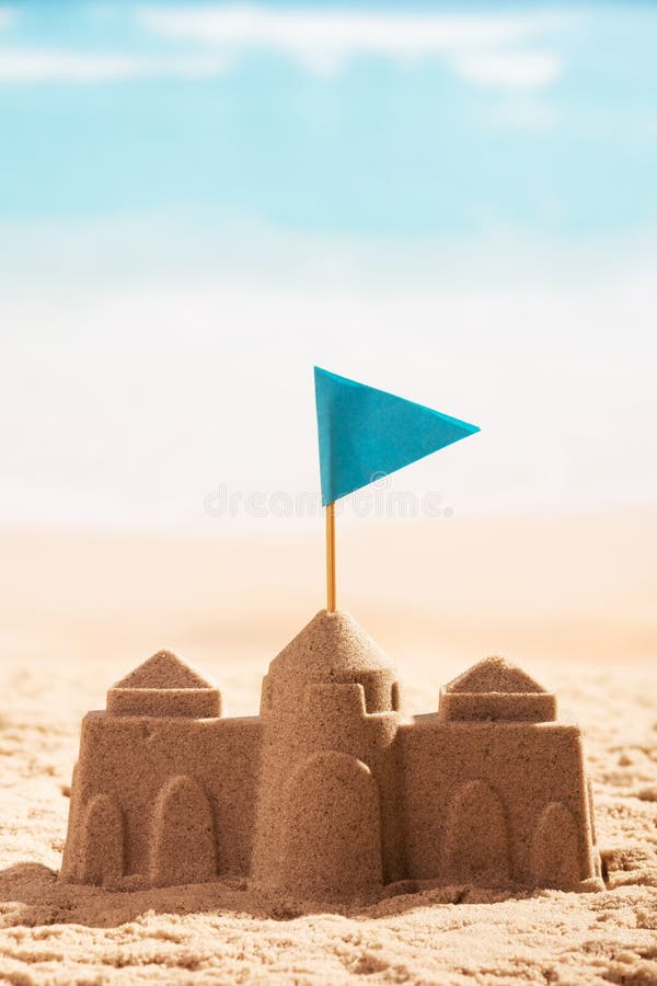 Sand Castle with Flag on the Sea Shore. Stock Photo - Image of detail ...