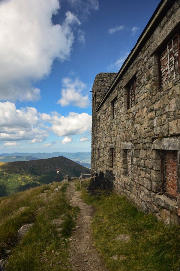 Castle Wall on Top of a Mountain, Near Path and Mountain Stock Image ...
