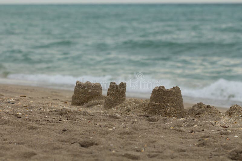 Castles made with sand stock photo. Image of sand, beach - 73100370