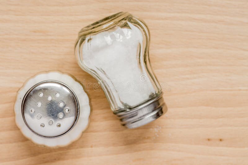 Glass Salt and Pepper Shakers Being Held by an Elephant Stock Image ...
